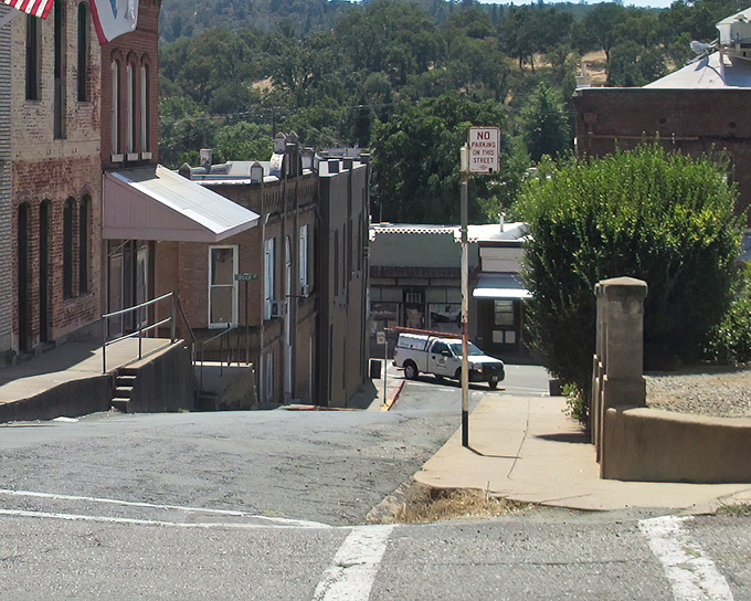 Jackson's hillside layout reveals layers of history, with buildings staggered on the slope like a diorama of Gold Country life.