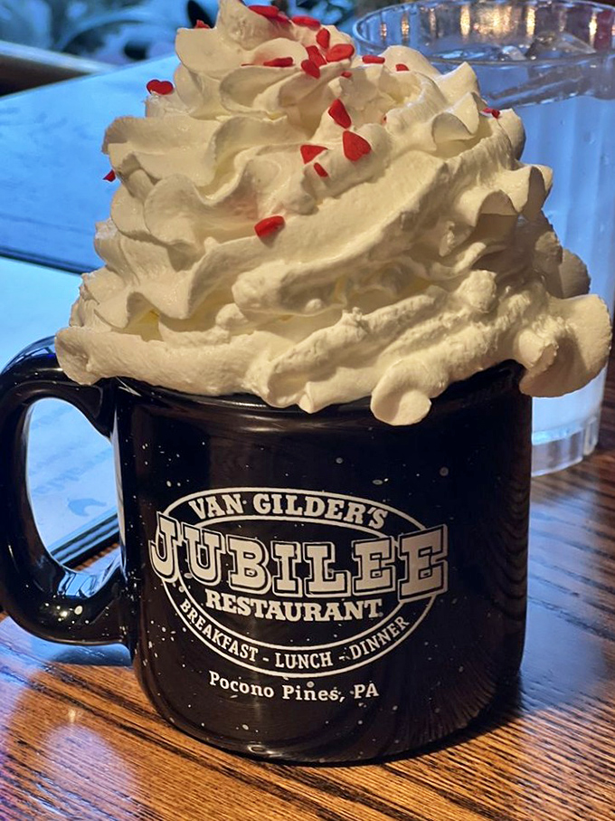 Hot chocolate that's wearing a party hat! This towering whipped cream masterpiece isn't a beverage&mdash;it's a celebration in a mug.