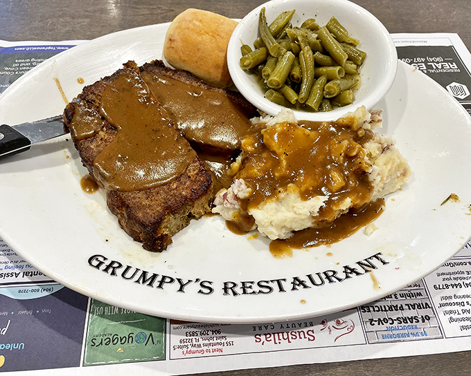 Comfort food that makes you want to invent a time machine. That gravy-soaked meatloaf and mashed potatoes combo whispers, "Nap time approaches."