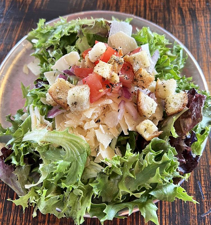 A salad that doesn't apologize for being healthy, dressed just enough to be interesting but not so much that it's hiding something.