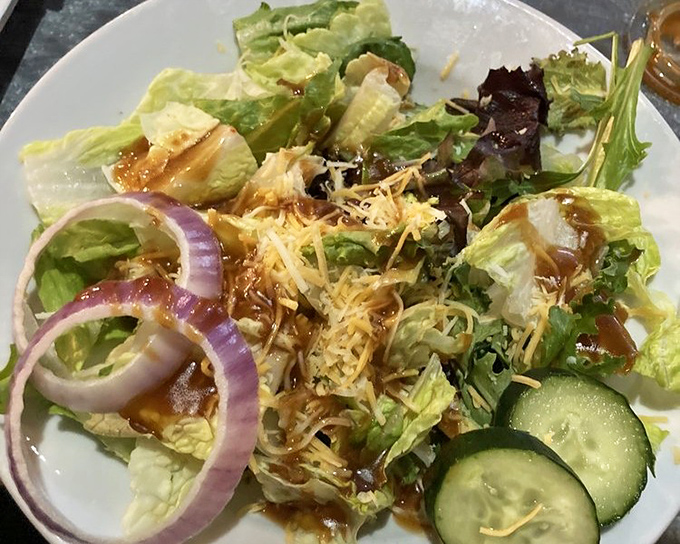 A salad that doesn't apologize for being a salad. Crisp, vibrant, and proving that Coosh's isn't just about indulgence—though that's definitely their specialty.