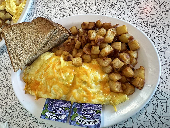 This cheese-blanketed omelet with perfectly crisped home fries is the breakfast equivalent of a warm hug from your favorite aunt.
