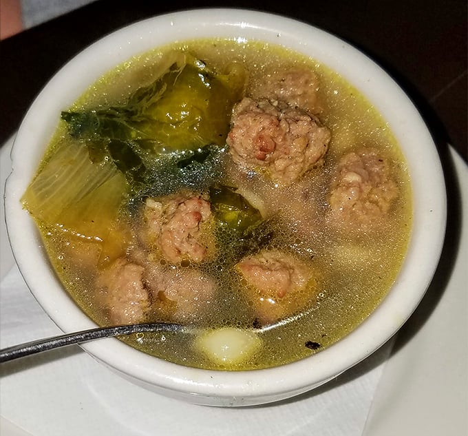 Italian wedding soup so comforting it could reconcile feuding families or at least make you forget about your in-laws.