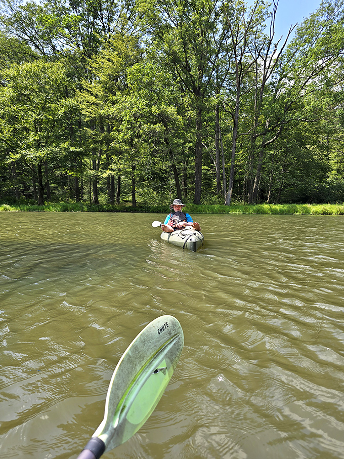 Paddling paradise found! Two kayakers discover that sometimes the best conversations happen on water, with only ripples to overhear your secrets.