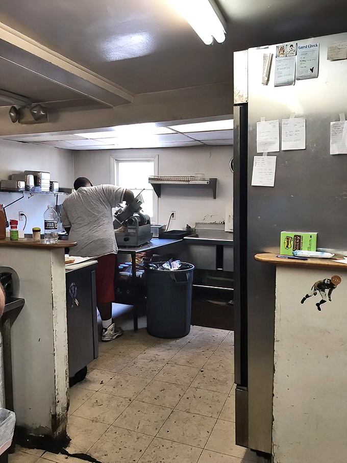 Behind the scenes in the kitchen – where the supporting cast of sides and sauces are crafted with the same dedication as the headlining meats.