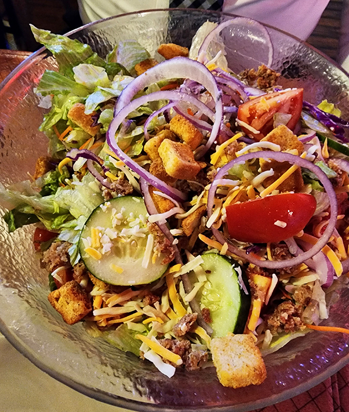 A salad so loaded it requires engineering skills to eat. The kind that makes you say, "I'll start my diet tomorrow."