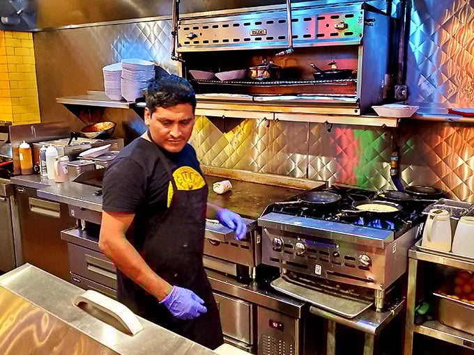 Behind the scenes, culinary magic happens on well-seasoned griddles. The kitchen crew works with the precision of a Nashville recording session.