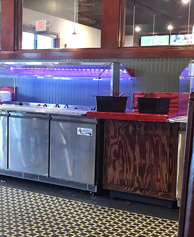 Where the magic happens&mdash;gleaming stainless steel and wood, the culinary workshop where ordinary ingredients become extraordinary meals.