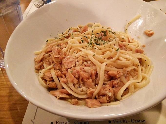 Linguini with clam sauce that speaks volumes&mdash;tender pasta strands mingling with savory seafood in a dish that transports you straight to coastal Italy.