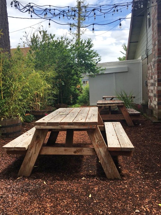 String lights and picnic tables create the perfect setting for savoring life's sweetest moments.