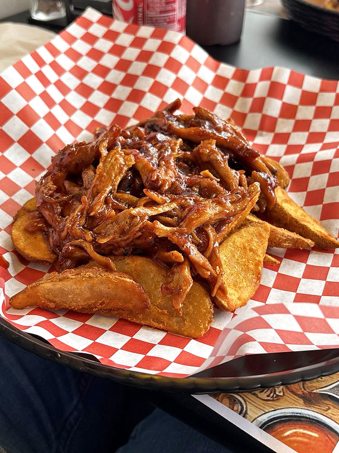 Pulled pork atop golden potato wedges&mdash;a BBQ summit meeting where everyone gets along deliciously.