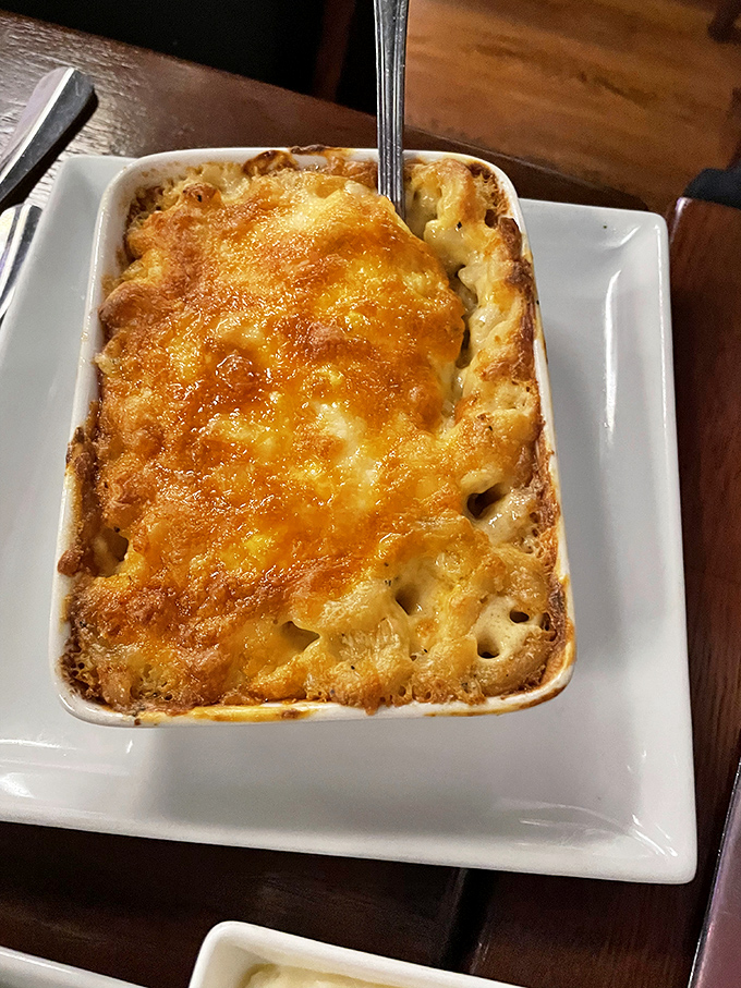 Lobster mac and cheese with a perfectly browned crust&mdash;comfort food that's had a sophisticated glow-up without forgetting its roots.