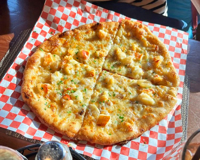 A flatbread that proves simplicity often trumps complexity&mdash;golden cheese, fresh herbs, and a crust with just the right amount of chew.