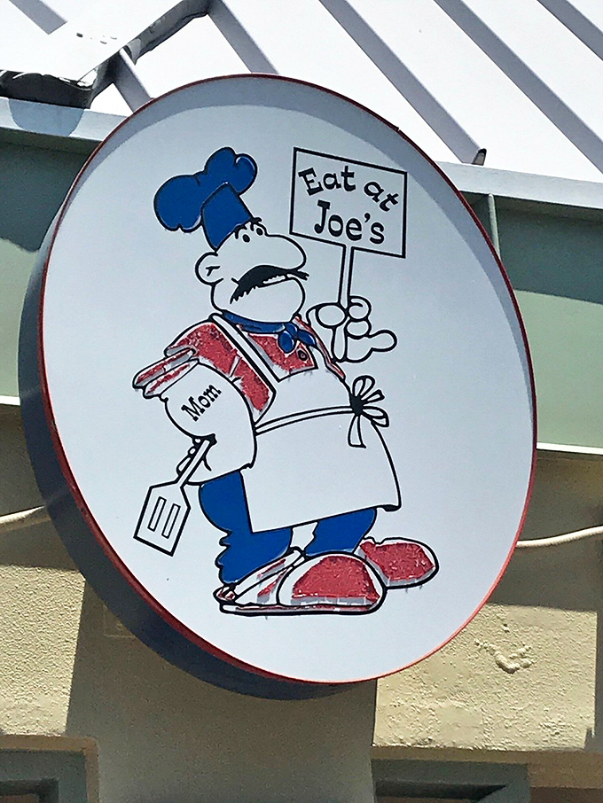 The cartoon chef mascot holding his "Eat at Joe's" sign might as well be saying "Resistance is futile" to hungry passersby.