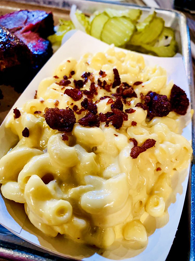 Mac and cheese topped with brisket crumbles isn't just a side dish&mdash;it's what comfort food dreams about when it goes to sleep at night.