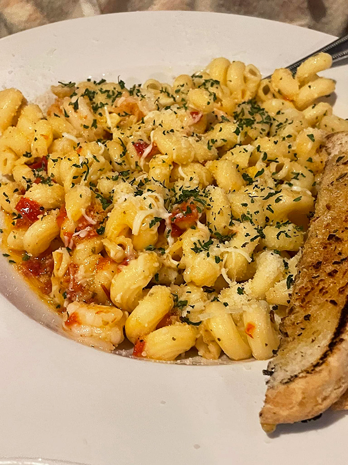 Pasta that doesn't just sit on the plate&mdash;it beckons. Each cavatappi curl cradles sauce and cheese in perfect, fork-twirling harmony.