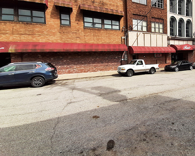 Red brick storefronts house local businesses that remember when customer service actually mattered.