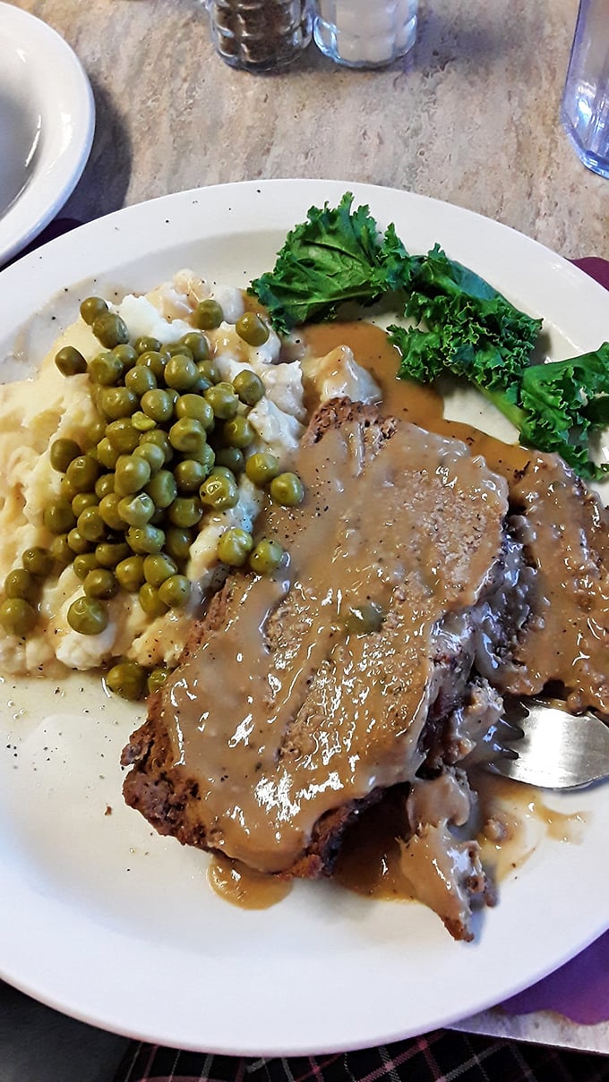 Meatloaf with gravy&mdash;the dish that reminds you why comfort food earned its name. No deconstruction or reimagining needed, just pure satisfaction.