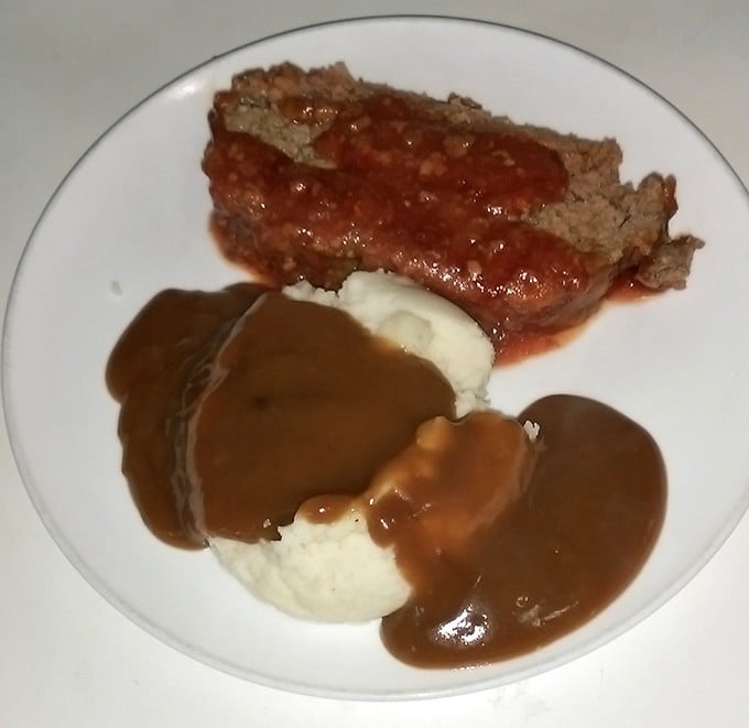 Meatloaf and mashed potatoes &ndash; the dynamic duo of Midwestern comfort food, swimming in gravy that deserves its own fan club.