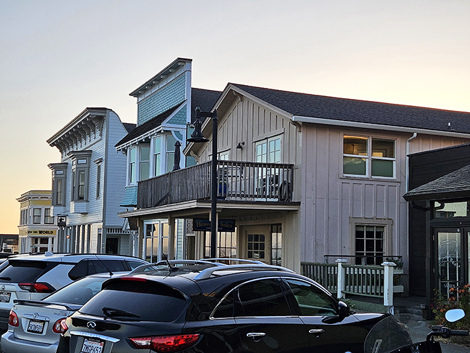 Twilight bathes Mendocino's historic buildings in soft golden light, transforming the village into a scene worthy of a romance novel cover.