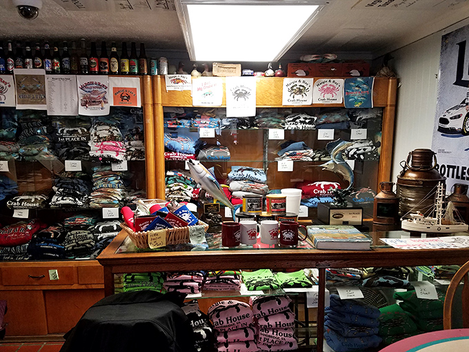 The merchandise corner &ndash; because nothing says "I conquered the crab feast" like a t-shirt that might not fit after your meal.