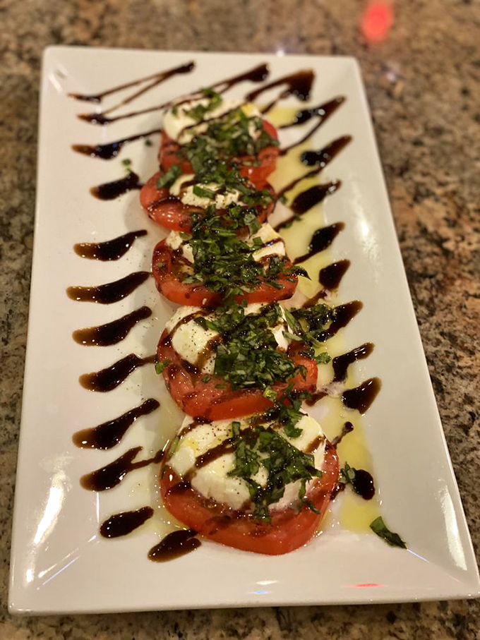 The caprese salad at JoJo's isn't just arranged&mdash;it's composed. Fresh tomatoes and mozzarella drizzled with balsamic create a starter that's both art and appetite stimulator.