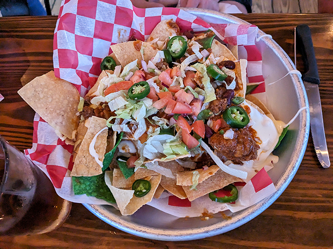 These nachos aren't just a starter&mdash;they're an event. Jalape&ntilde;os stand at attention among a mountain of toppings that demand to be shared.
