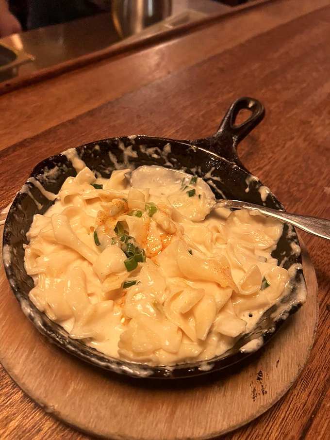 The Noodle Bake arrives bubbling with four cheeses in a cast iron skillet&mdash;comfort food that's had a serious upgrade without losing its soul.