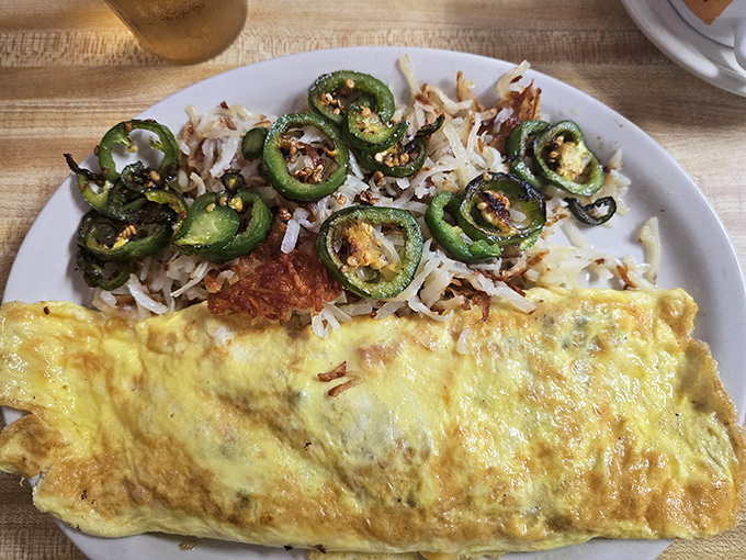 An omelet that's seen some things, topped with jalape&ntilde;os that mean business. This isn't brunch &ndash; it's breakfast with attitude.