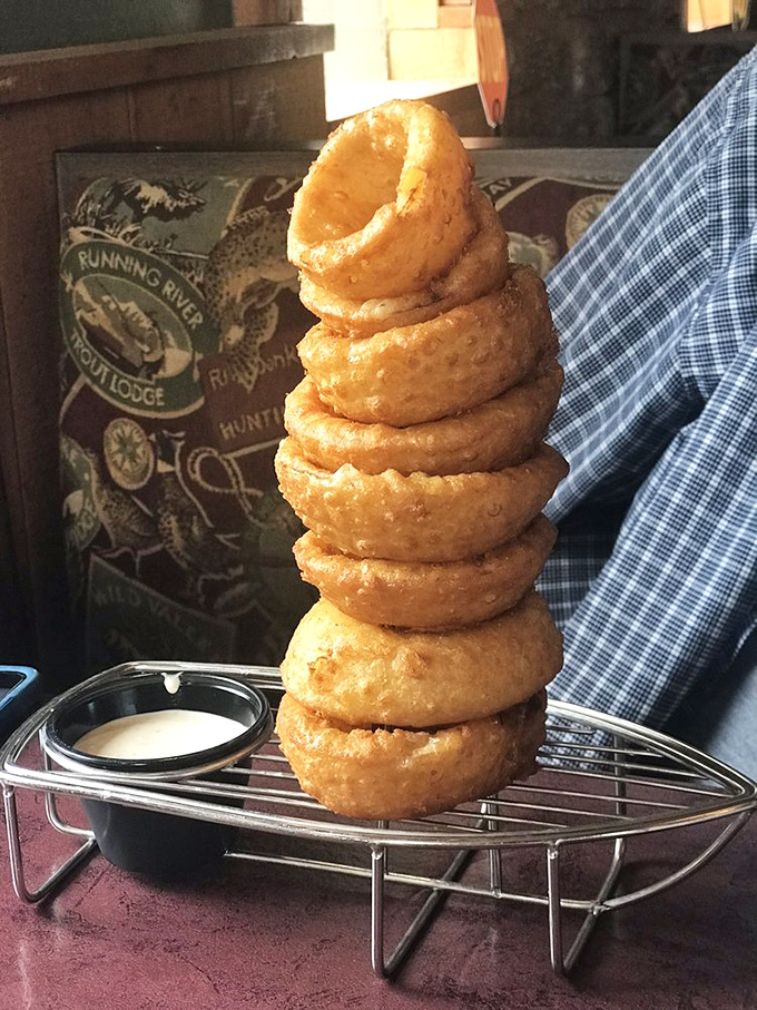 An onion ring tower that demands respect and strategy&mdash;do you start from the top or bottom? Either way, dipping sauce is mandatory.