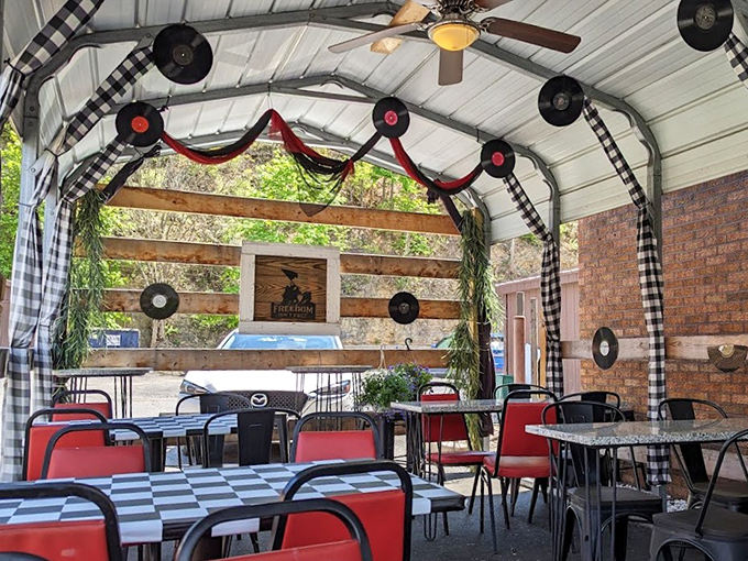 Outdoor seating with vinyl records as d&eacute;cor&mdash;because good food deserves a soundtrack. Al fresco dining, diner-style.