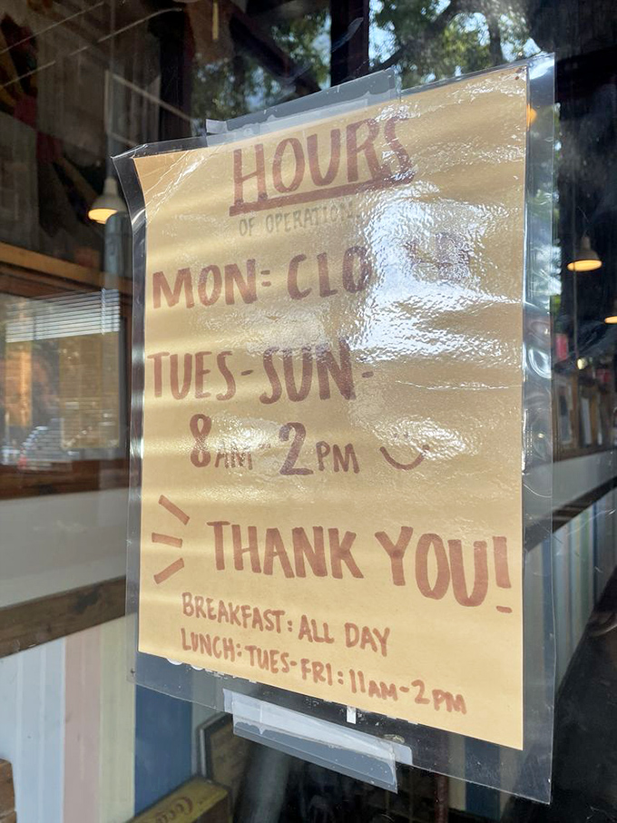 The hours sign tells you everything you need to know: breakfast all day and closed Mondays because even comfort food legends need a day off.