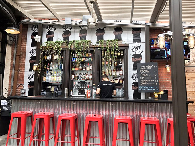 The outdoor bar brings the inside out, with cow illustrations reminding you exactly what this establishment celebrates&mdash;bovine brilliance in all forms.