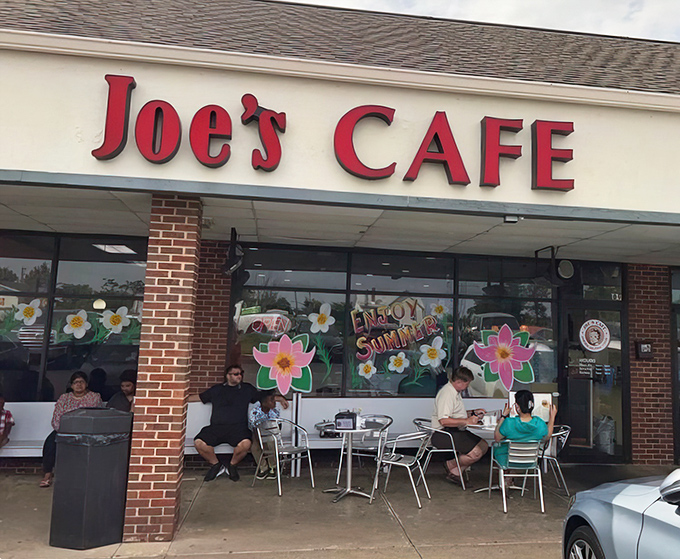 Summer blooms on the windows while outdoor tables offer fresh air dining&mdash;proof that good food tastes even better with a side of sunshine.