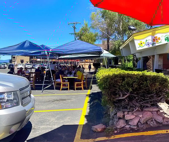 Pandemic pivoting, Tahoe style. Blue canopies and fresh air create an outdoor dining experience where pancakes taste even better under the Sierra sky.