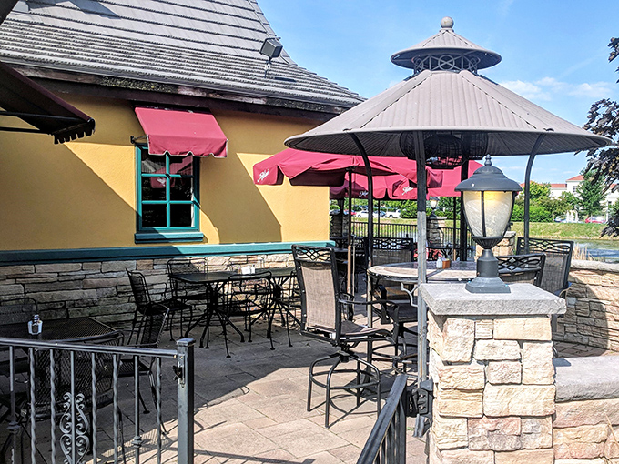 Al fresco dining with a side of Ohio sunshine. Those red umbrellas aren't just shade—they're optimistic pops of color against the sometimes-gray Midwestern sky.