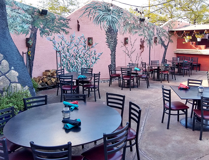 The outdoor patio's pink walls and desert plants create an oasis vibe. A perfect escape from reality without having to update your passport.