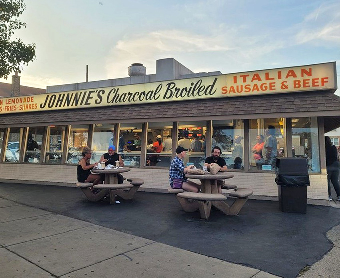 As dusk settles, the outdoor tables become community gathering spots, where strangers united by beef appreciation share the universal language of "mmmmm."