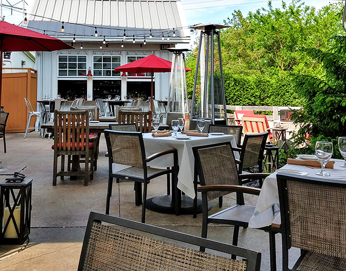 Outdoor dining that makes you wonder why we ever eat inside. Those heat lamps aren't just for warmth—they're deadline extenders for perfect evenings.