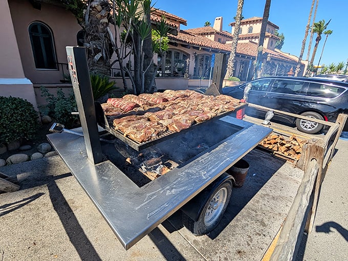 Where the magic happens: steaks getting the outdoor grill treatment. The smoke signals being sent are universally understood as "come and get it."