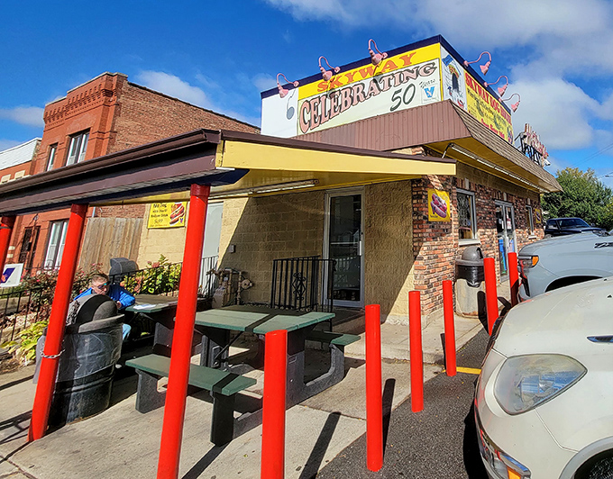 The outdoor seating area&mdash;simple picnic tables where strangers become neighbors over the shared language of great food.