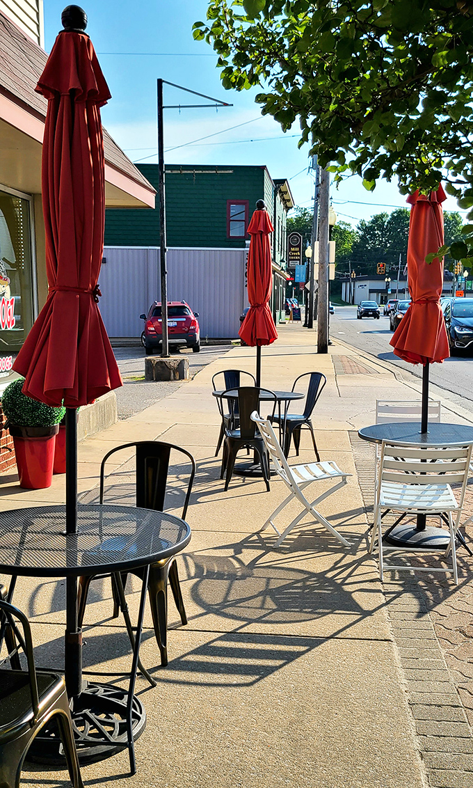 The sidewalk seating area with bright red umbrellas offers a front-row seat to Comstock Park life while you contemplate how many hot dogs is too many hot dogs.