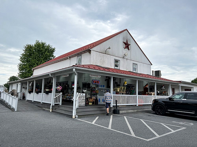 The bakeshop's exterior view reveals its farmhouse charm. That wraparound porch has witnessed countless sugar-fueled pilgrimages from dessert devotees nationwide.