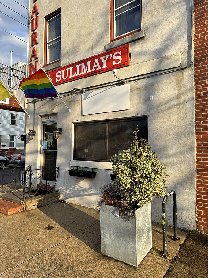 The rainbow flag outside isn't just decoration—it's Sulimay's quiet promise that their welcome is as warm as their pancakes.