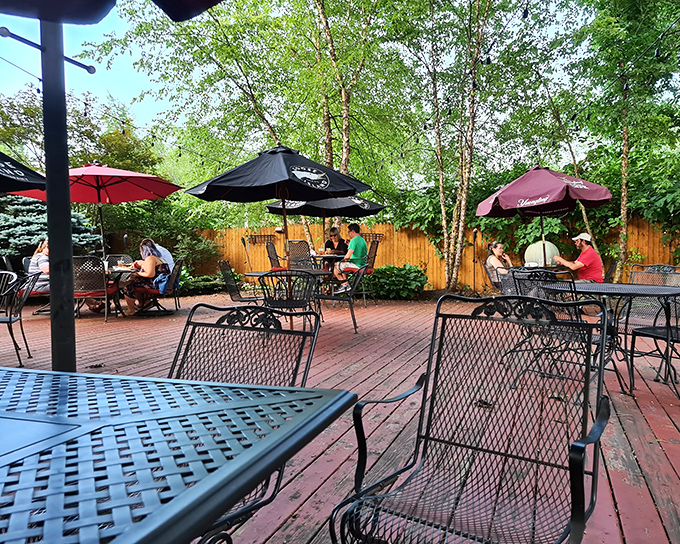 The outdoor patio offers umbrella-shaded tables where summer evenings stretch longer, and barbecue somehow tastes even better.
