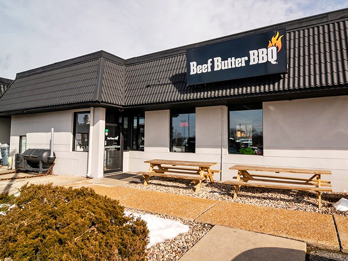 Simple wooden picnic tables outside say everything about Beef Butter's priorities &ndash; they put their energy into the food, not fancy furniture. Smart move.