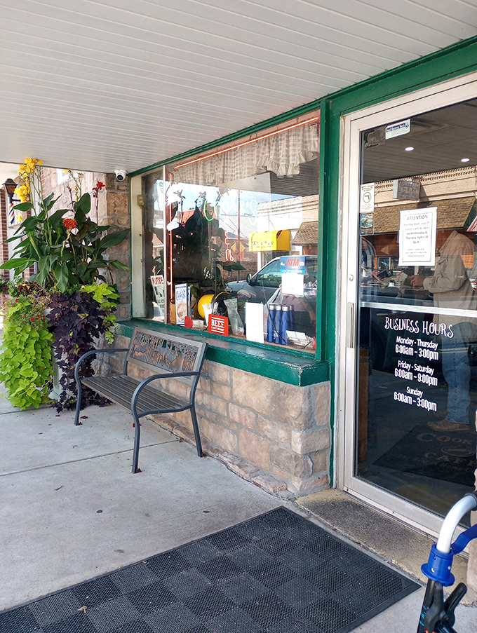 The entrance says everything about small-town hospitality&mdash;simple bench, welcoming flowers, and a door that's been held open for neighbors and strangers alike.