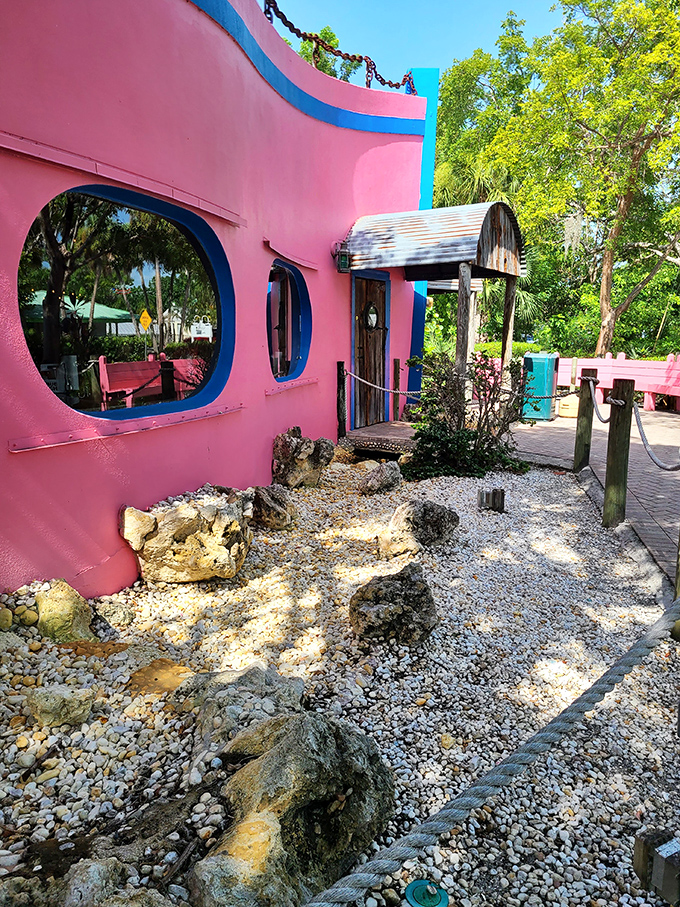 Architecture with personality that's more "Florida fun" than "cookie-cutter resort." These bubble windows and pink walls scream tropical charm.
