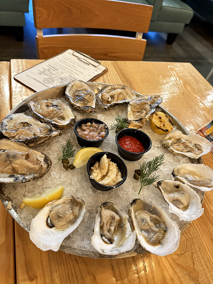 These oysters aren't just served; they're presented—a briny carousel of ocean treasures with all the right accompaniments for your slurping pleasure.