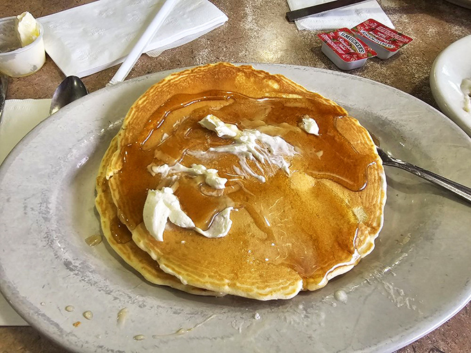 Pancakes that don't need Instagram filters&mdash;just butter melting into golden pools and maple syrup creating amber rivers across their fluffy landscape.